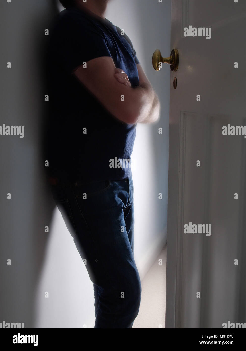 Man leaning against door hi-res stock photography and images - Alamy