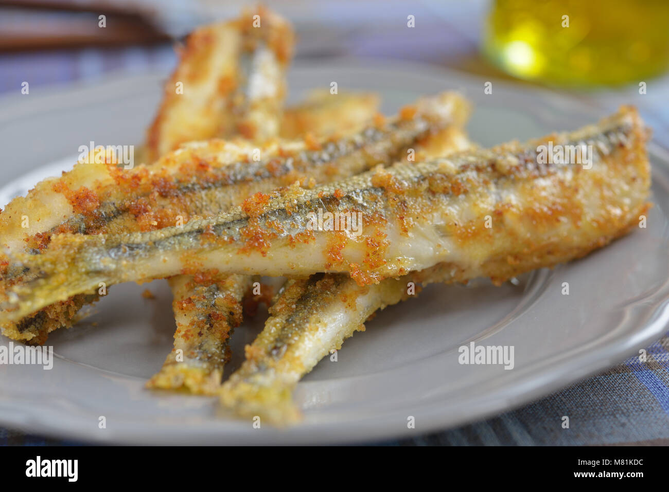 Roasted smelt fish on a plate Stock Photo - Alamy