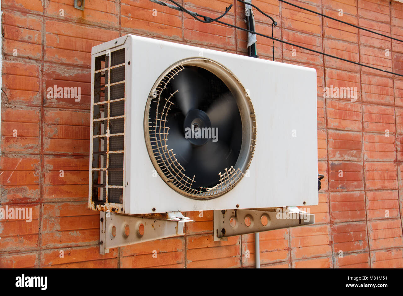 Working old compressor air-conditioner Stock Photo - Alamy