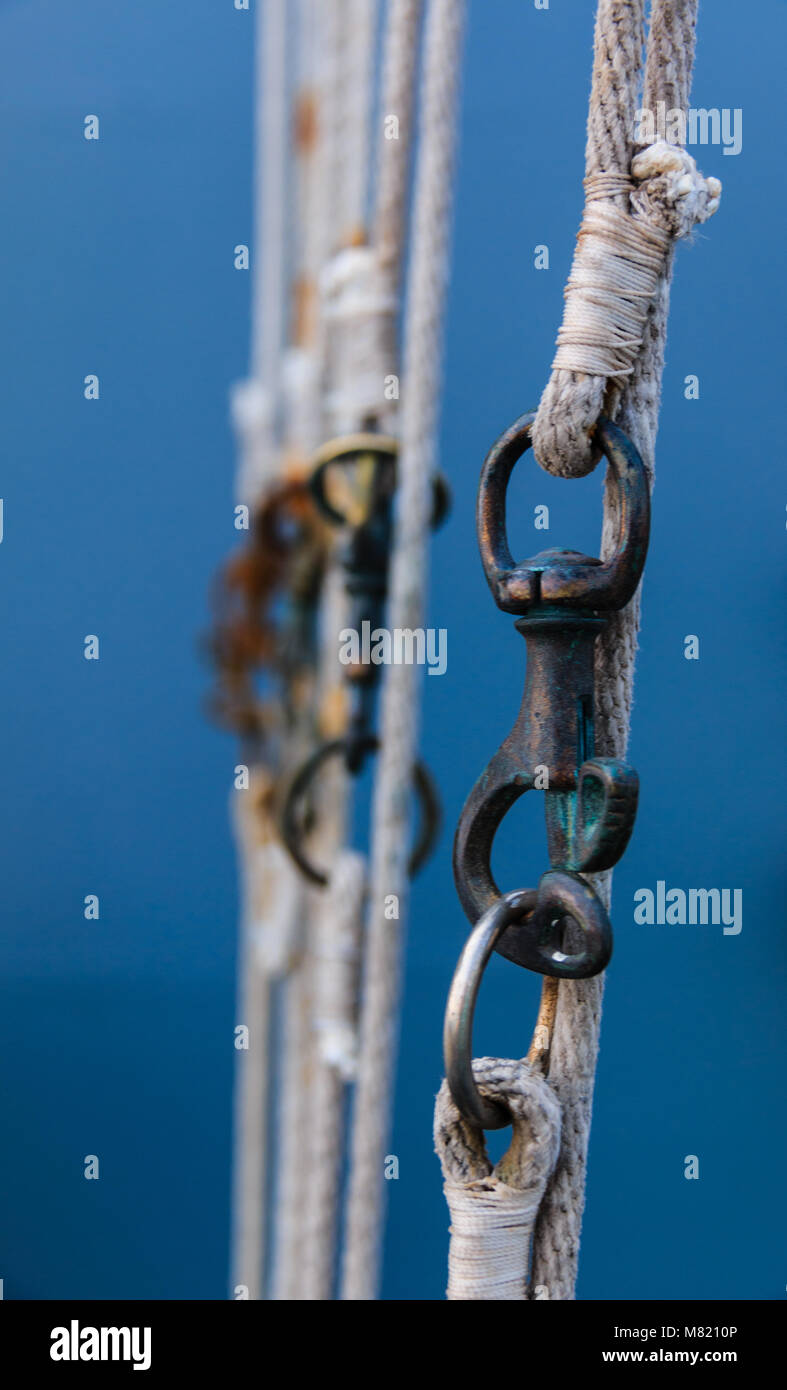 hook hanging on flag rope onboard warship Stock Photo - Alamy