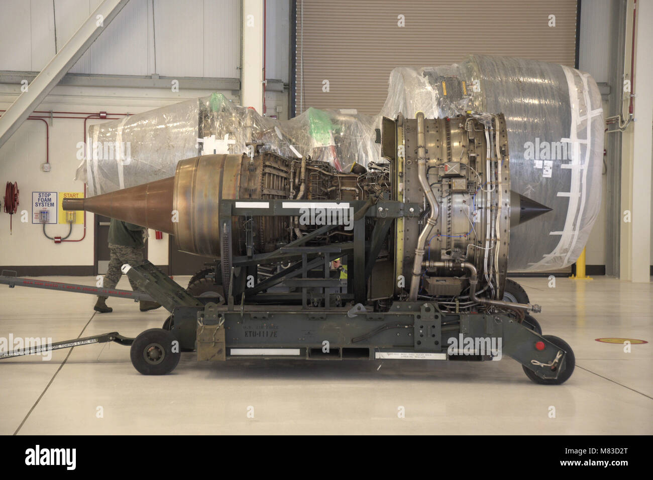 A KC-135 Stratotanker engine sits in front of a new KC-46 Pegasus ...