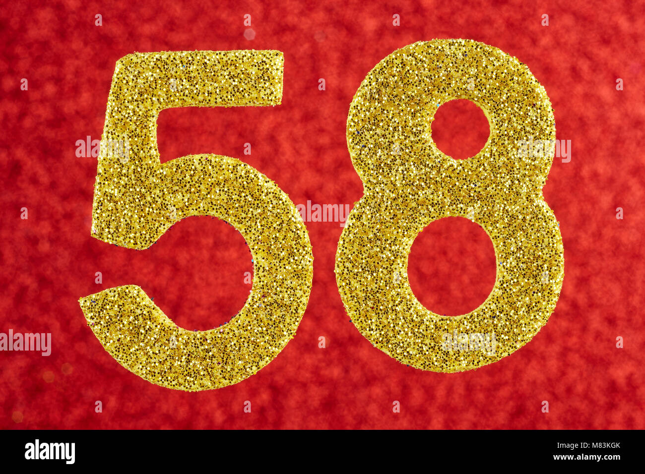 Number fifty-eight gold color over a red background. Anniversary ...