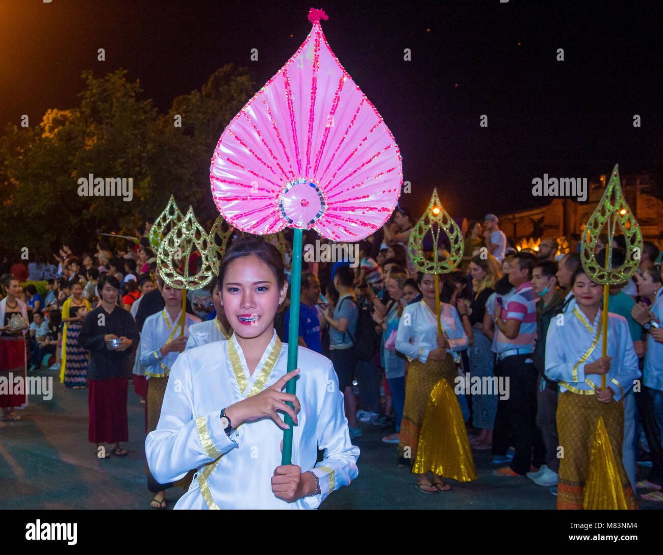 Participants in a parade during Yee Peng festival in Chiang Mai ...