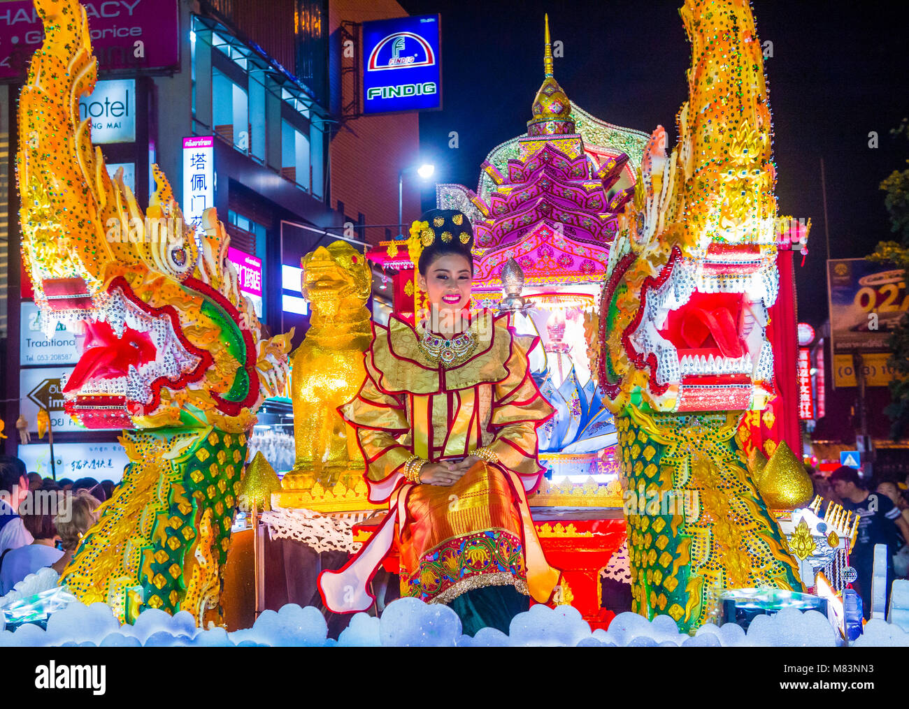 Participants in a parade during Yee Peng festival in Chiang Mai ...