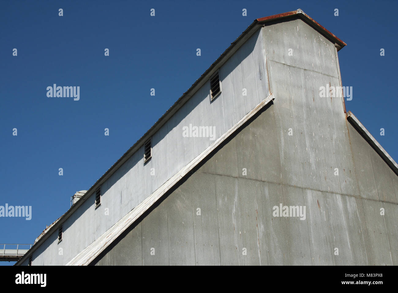 A Peanut Processing Plant against a blue sky Stock Photo - Alamy