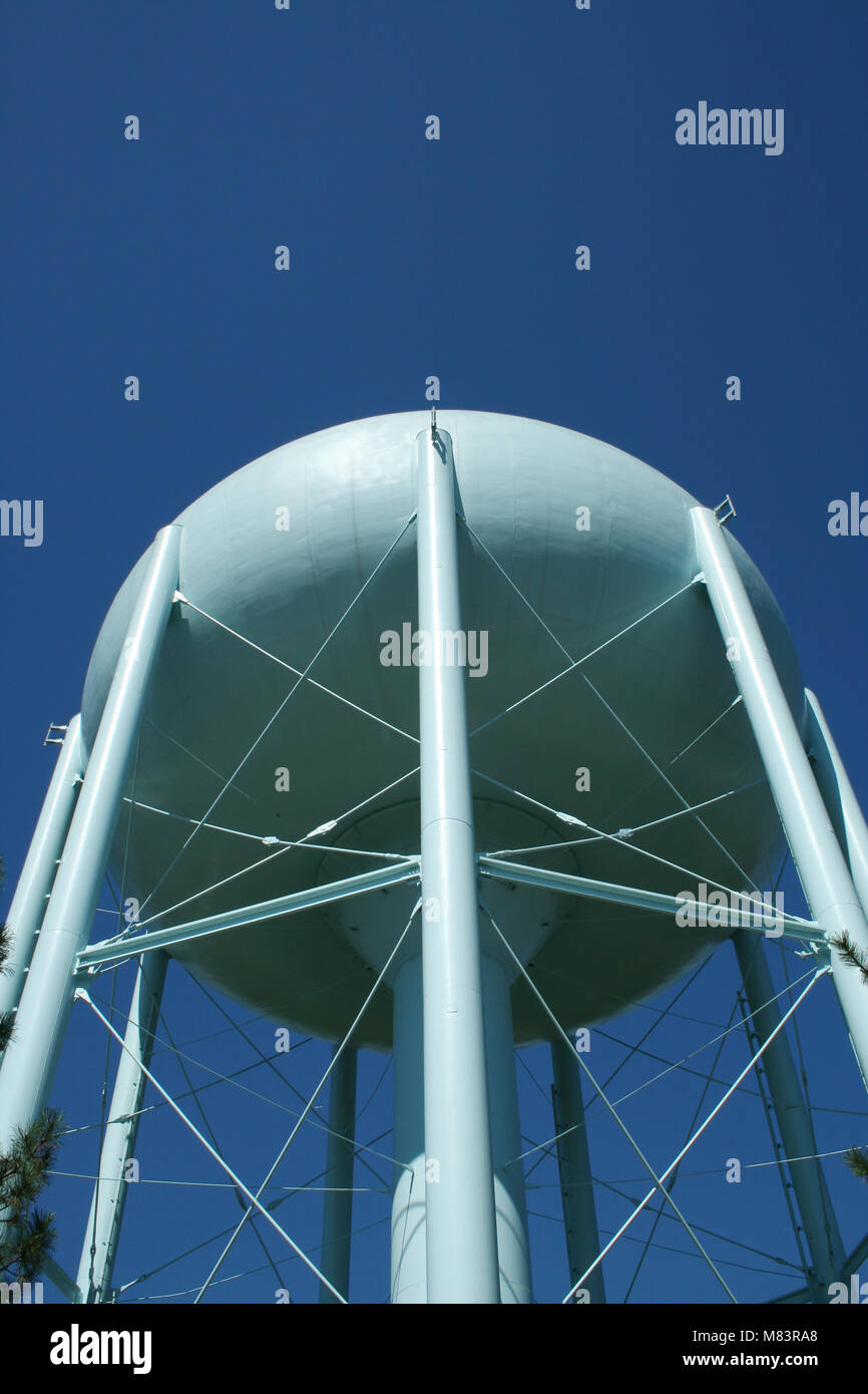 Blue Water Tower against a blue sky Stock Photo - Alamy