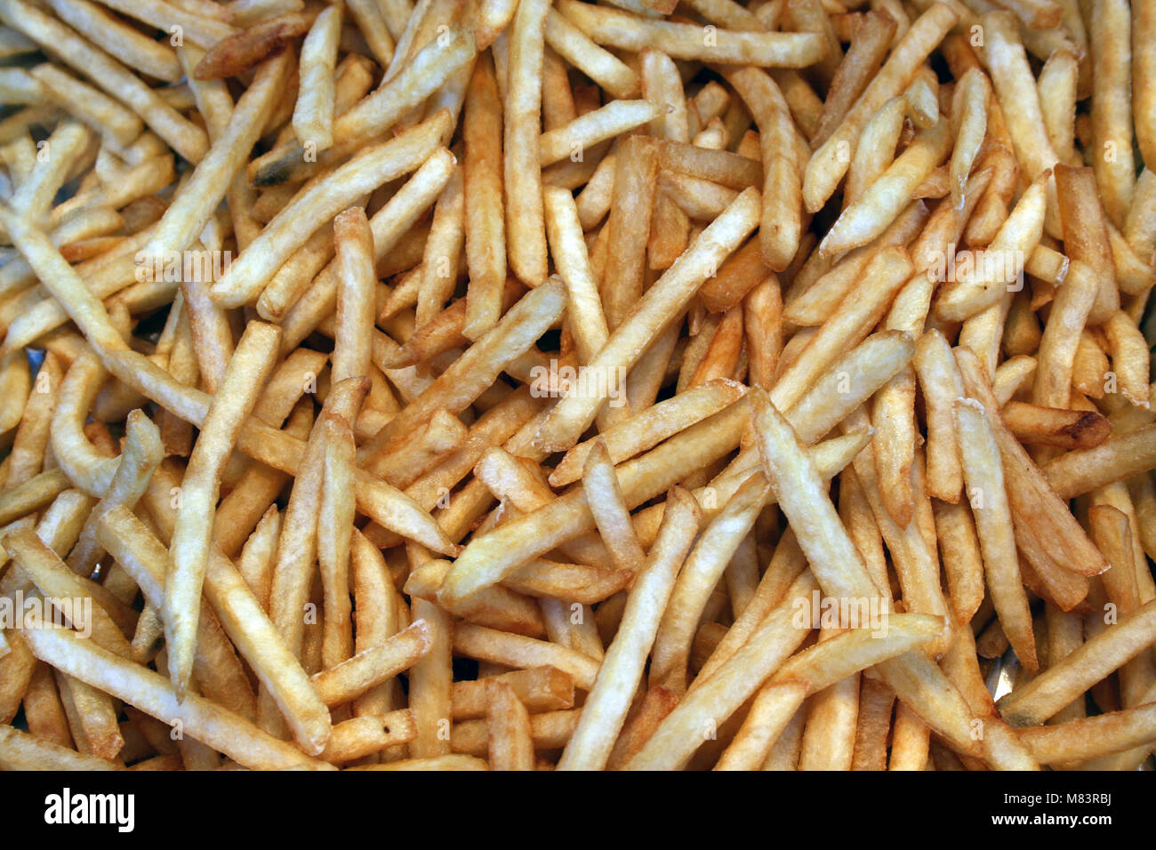 a bunch of french fries ready to eat Stock Photo - Alamy