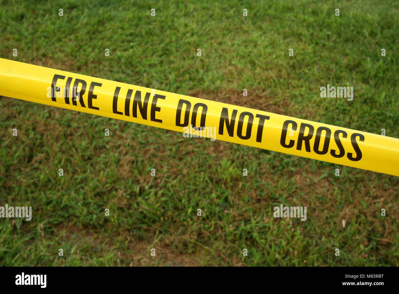 Some Fire line do not cross tape Stock Photo - Alamy