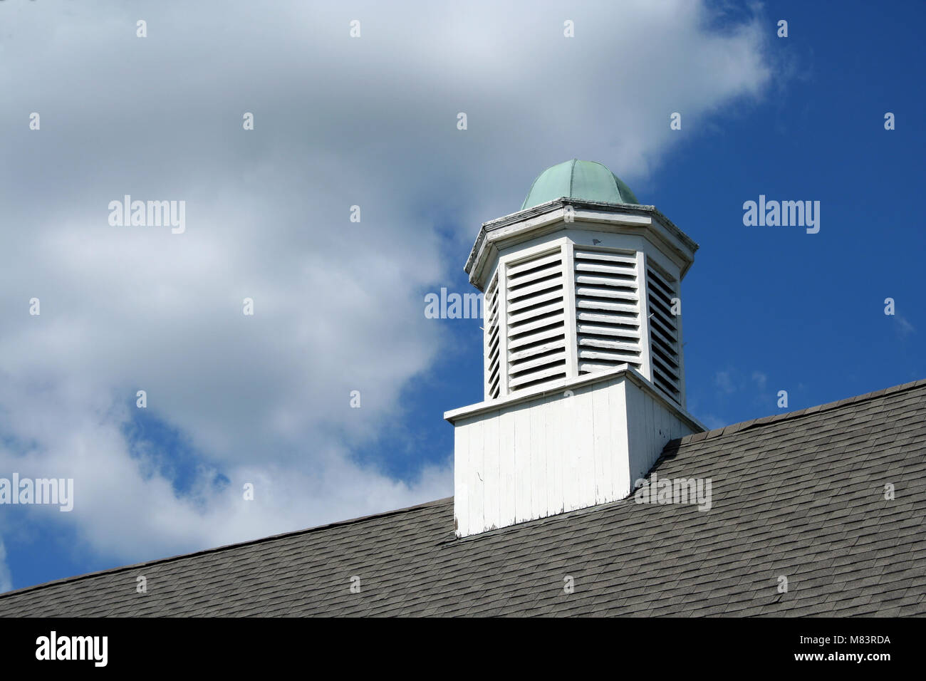 A Building peak crowsnest against blue sky Stock Photo - Alamy