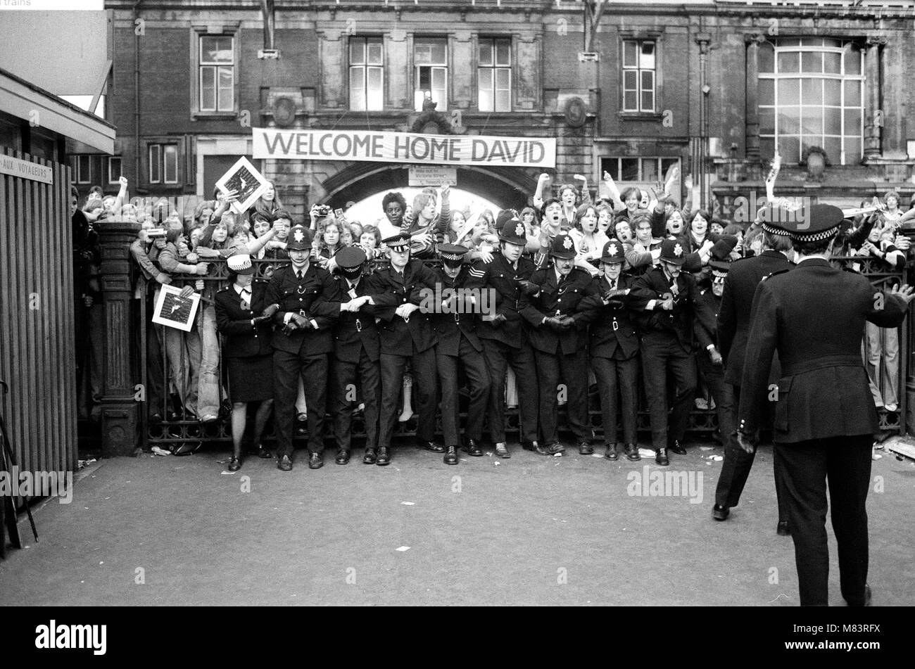 British pop singer David Bowie arrives home at Victoria Station, London ...