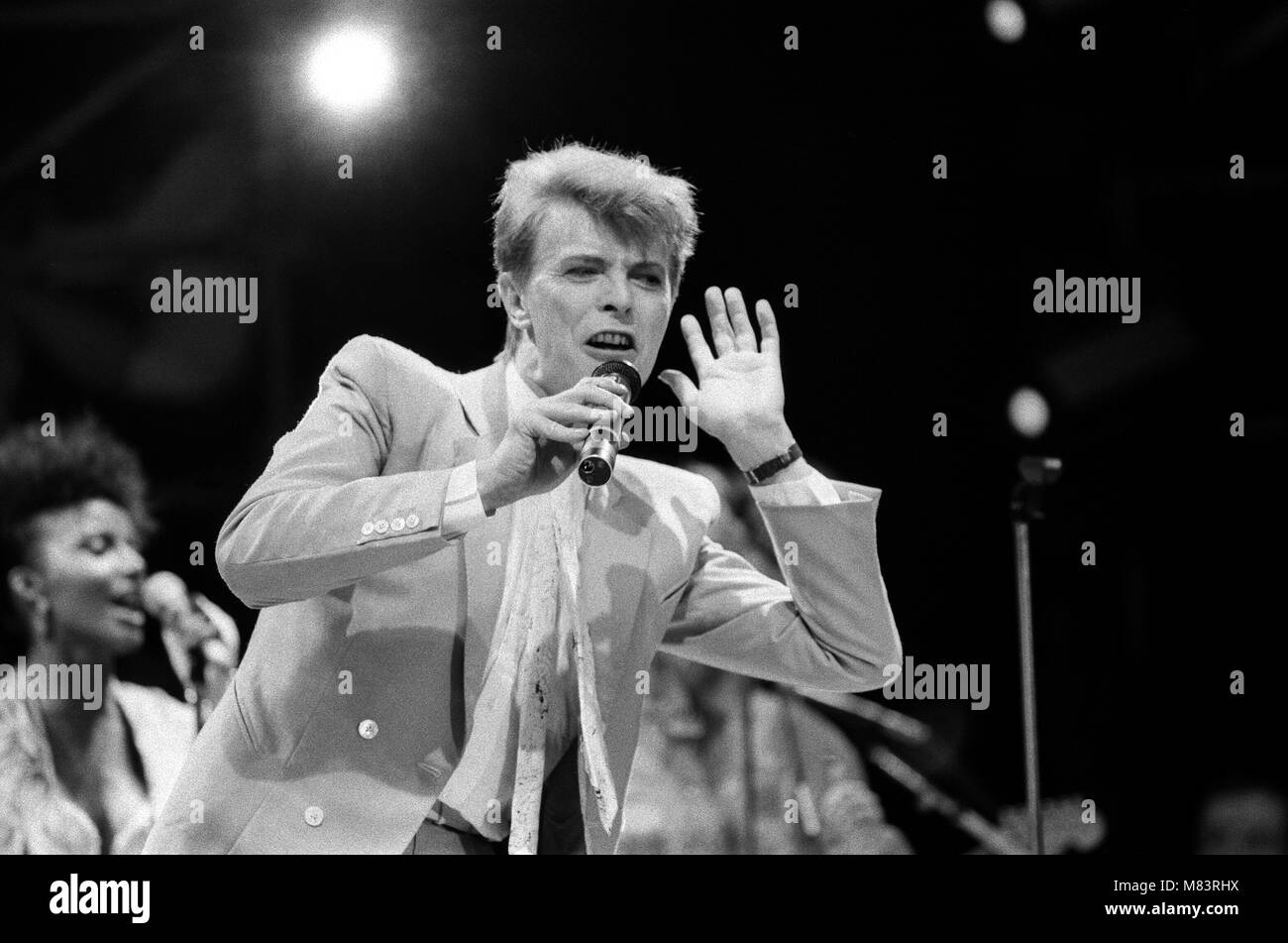 British pop singer David Bowie performing on stage during the Live Aid ...