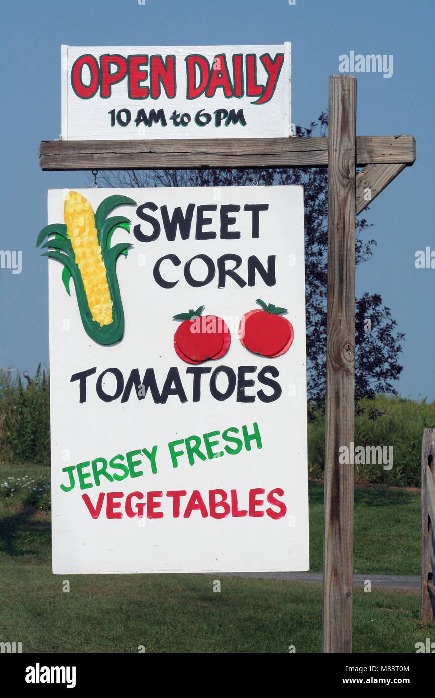 A Roadside Market Farm Stand Sign against blue sky Stock Photo - Alamy