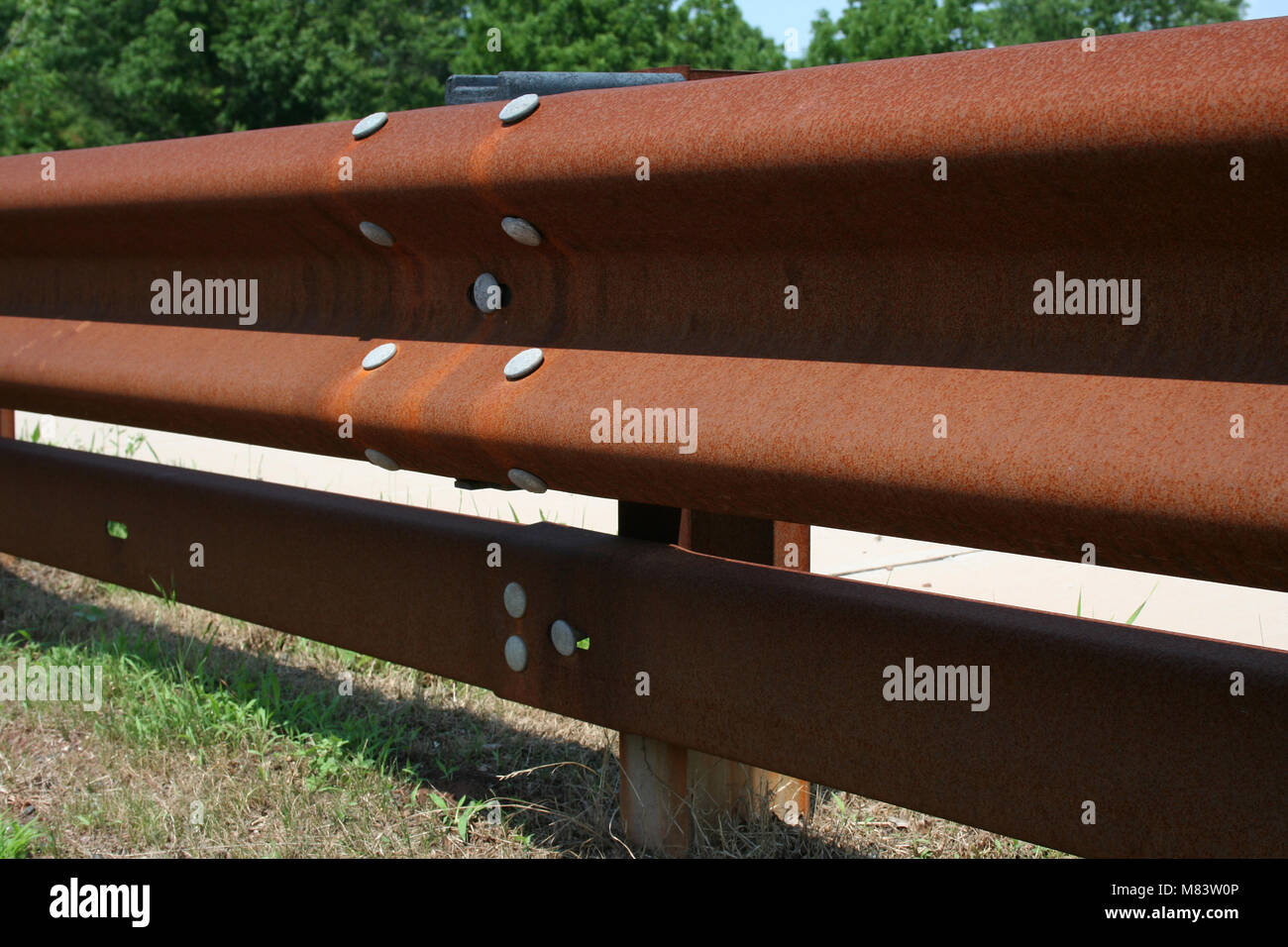 an image of a Rusty Guardrail Stock Photo - Alamy