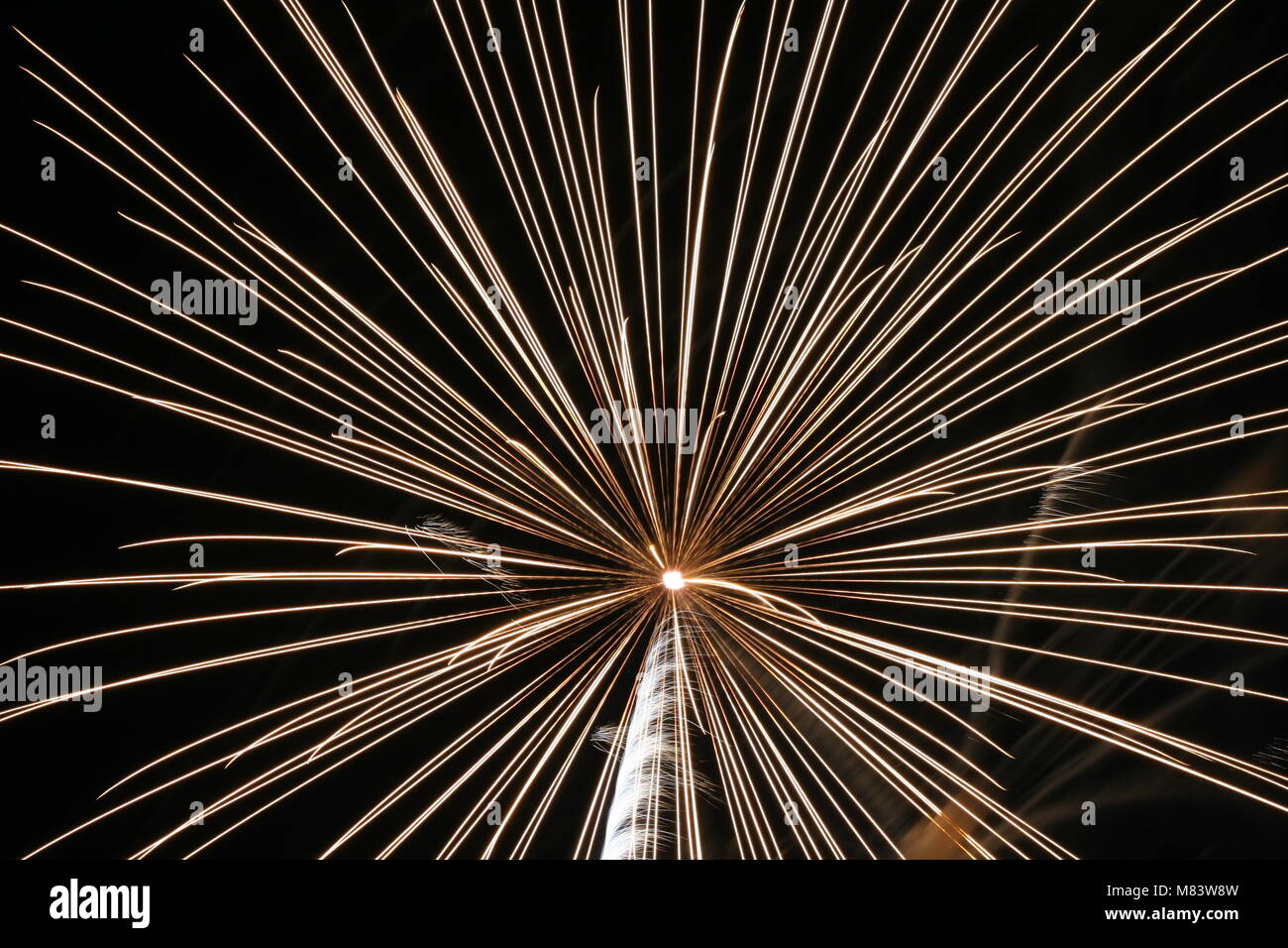 an image of exploding fireworks at night Stock Photo - Alamy