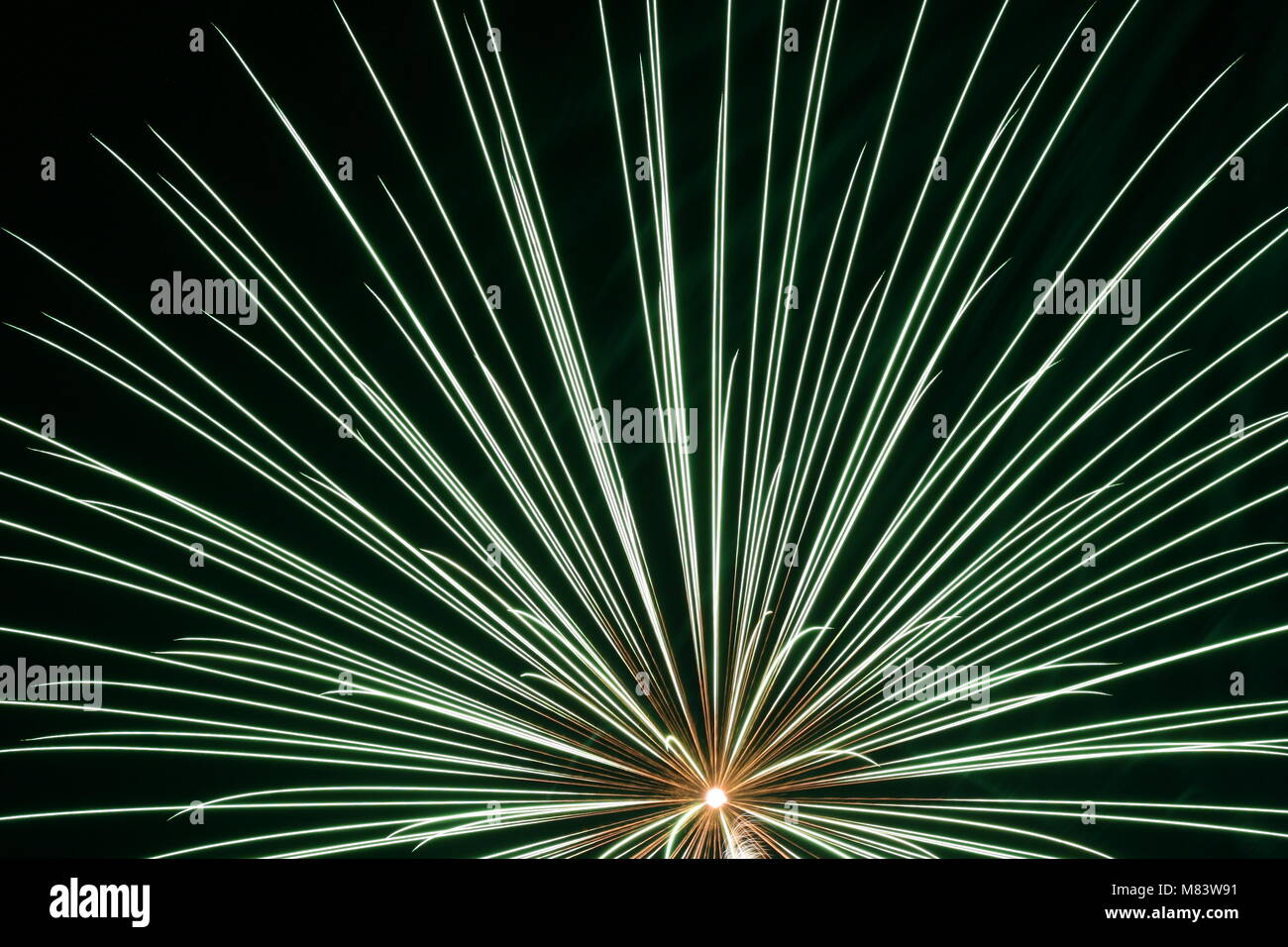 an image of exploding fireworks at night Stock Photo - Alamy
