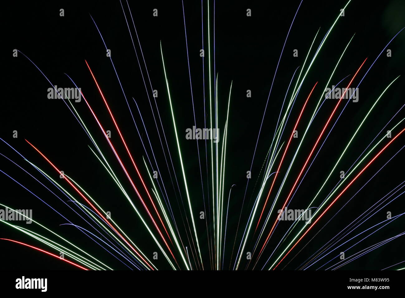 an image of exploding fireworks at night Stock Photo - Alamy