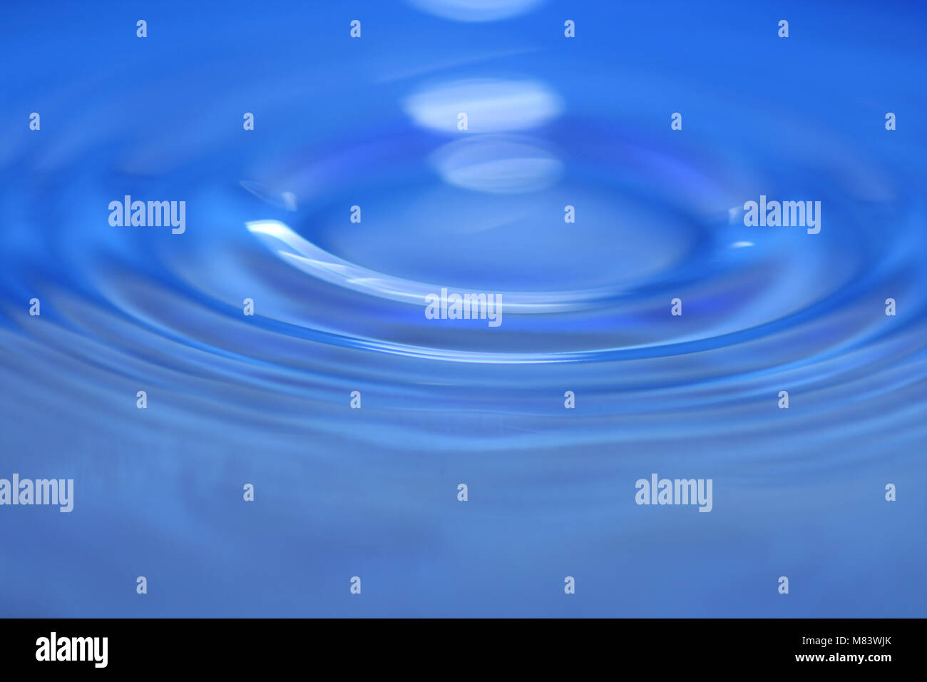 A Blue water ripples backgroud Stock Photo - Alamy