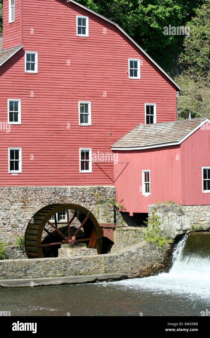A old grist mill on a river Stock Photo - Alamy