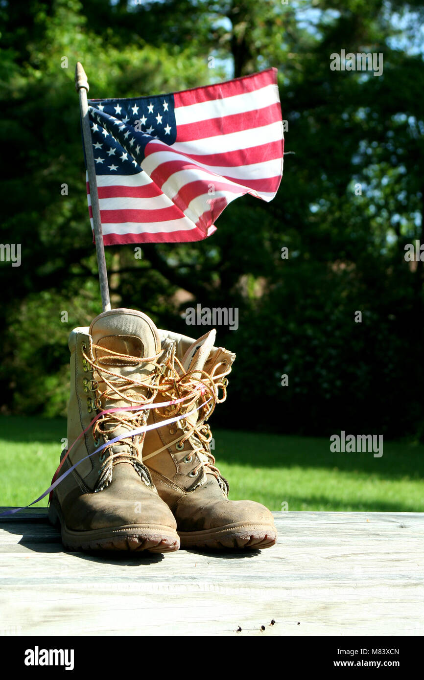A patriotic symbol of boots and flag Stock Photo - Alamy