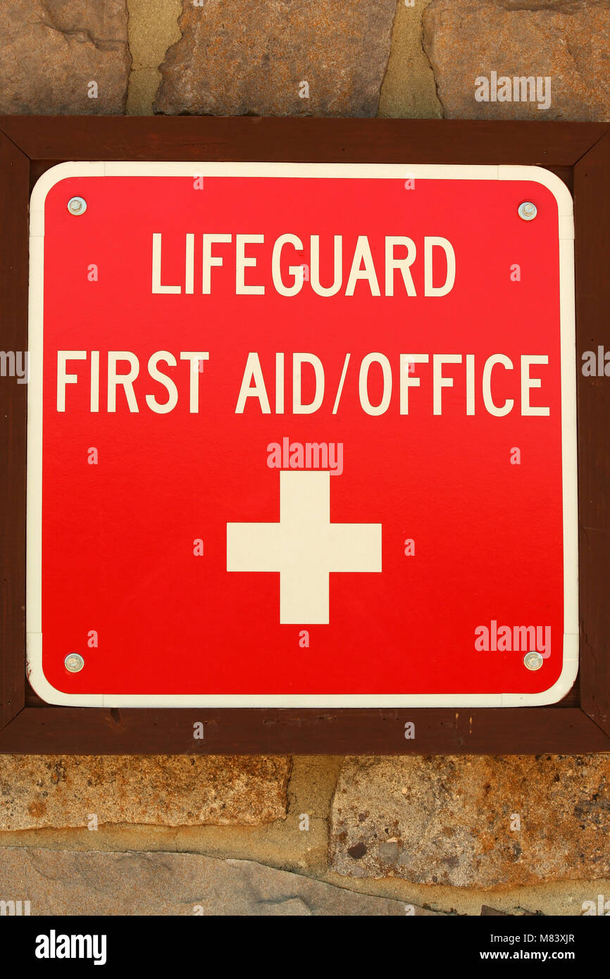 A lifeguard and first aid sign Stock Photo - Alamy