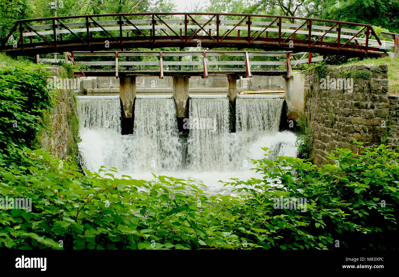 A bridge of a canal spillway Stock Photo - Alamy
