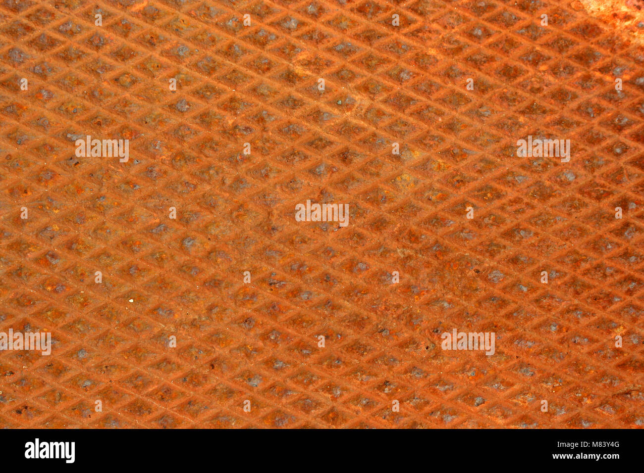 A Rusty diamondplate background texture Stock Photo - Alamy