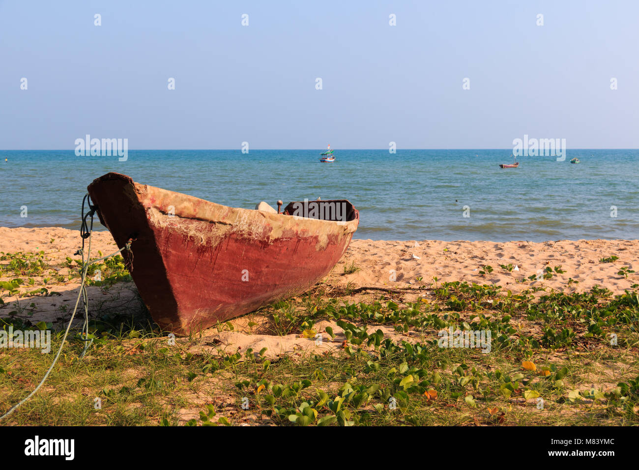 Old Fishing boat on the beach Stock Photo - Alamy