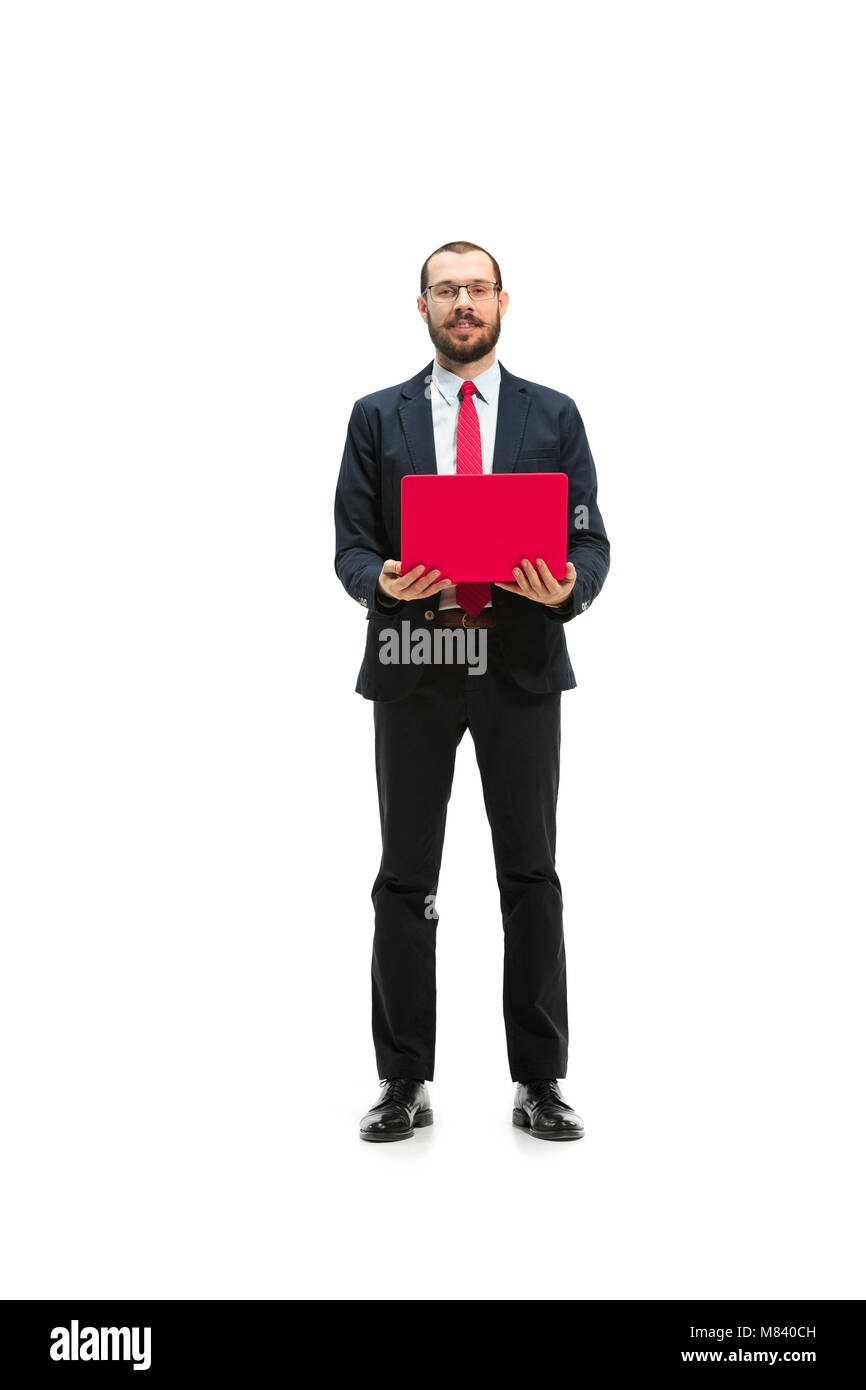 Picture of handsome young bearded man standing over white studio ...