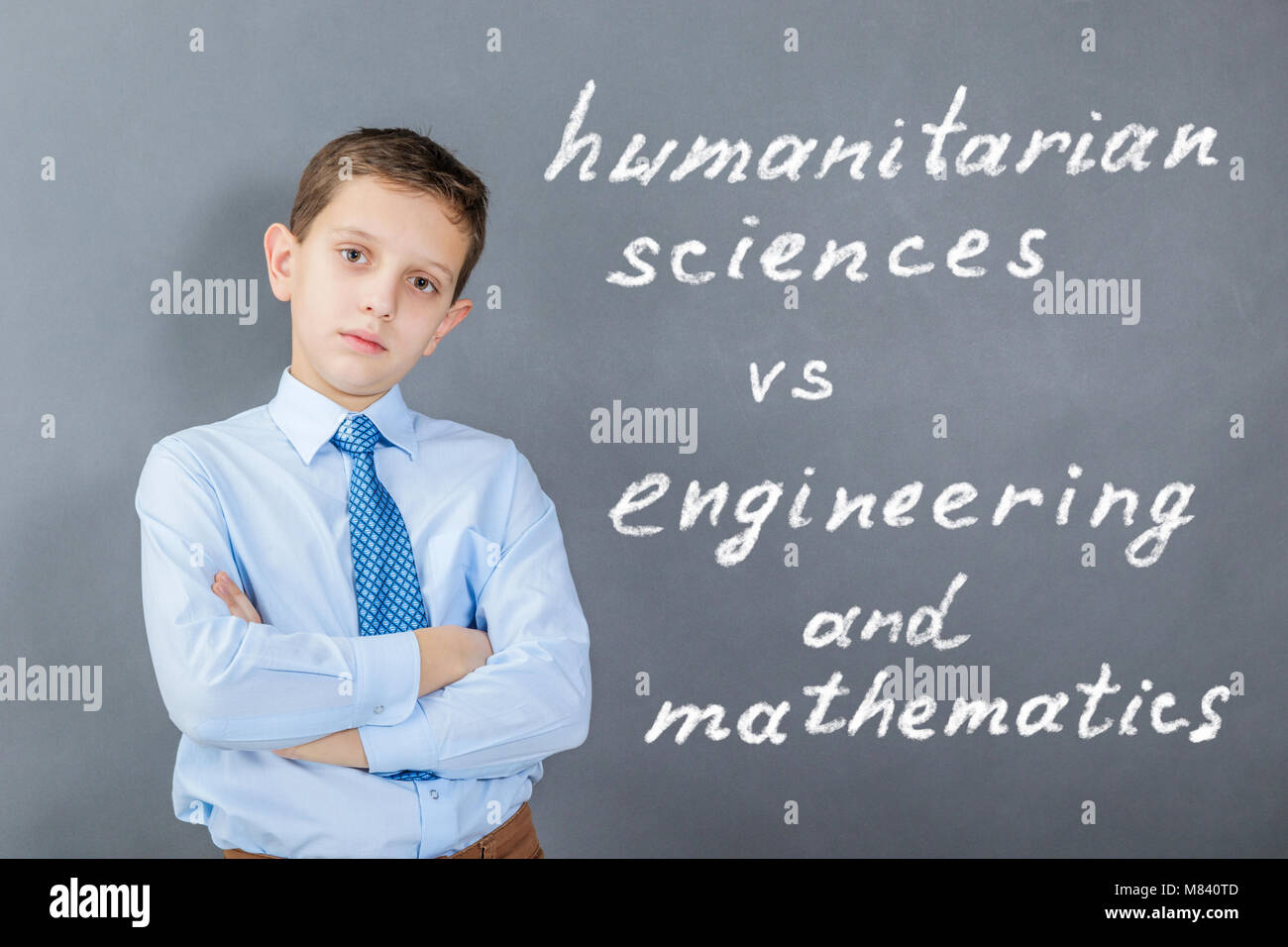 Humanitarian sciences vs engineering and mathematics. Confident boy ...