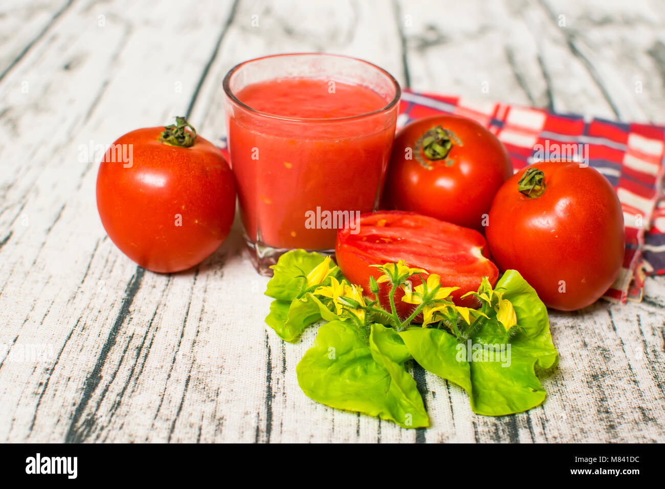 Tomato smoothie - tomato juice on wood background Stock Photo - Alamy