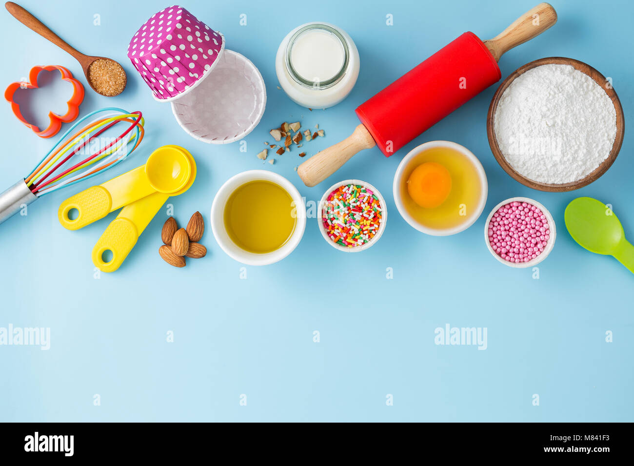 Baking background with ingredients eggs, flour, milk, suga and cake ...