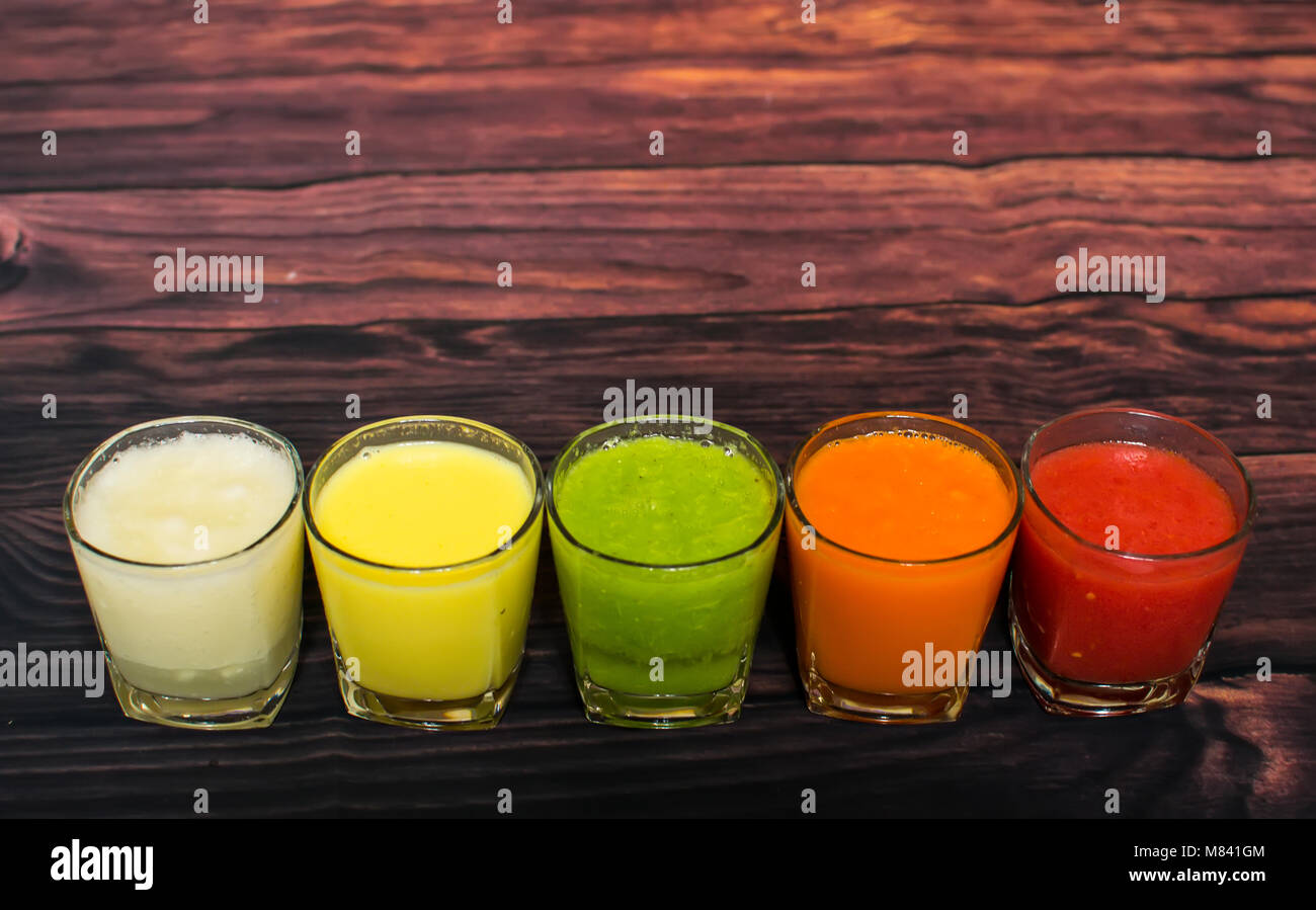 Healthy smoothies with fresh ingredients on a kitchen board Stock Photo ...