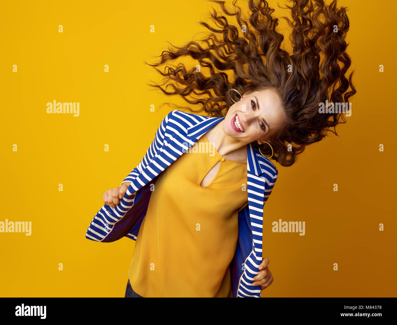 Stylish female shaking hair in hi-res stock photography and images - Alamy