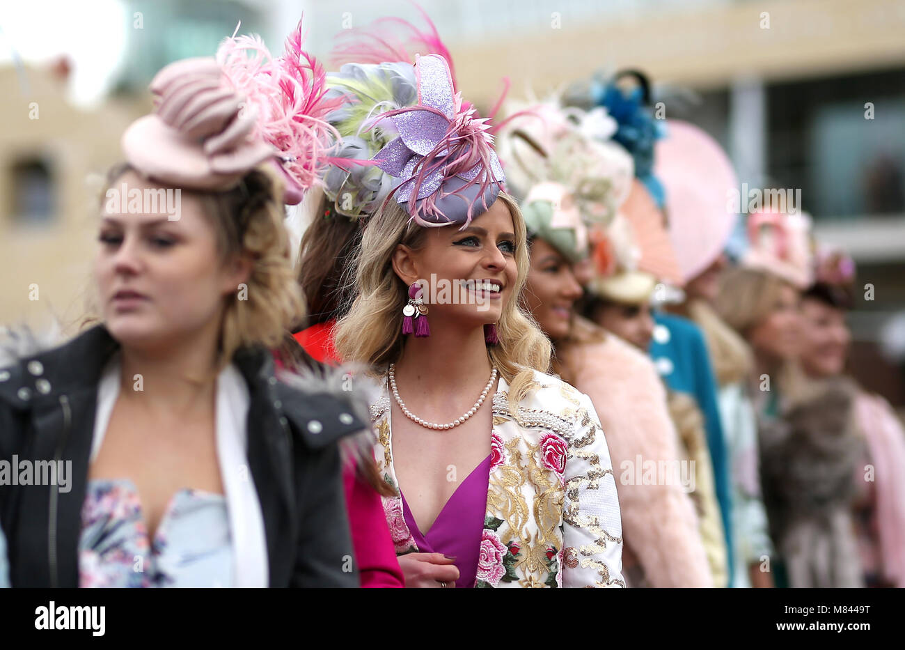 Female racegoers takes part in the Miss Cheltenham finalists line up ...