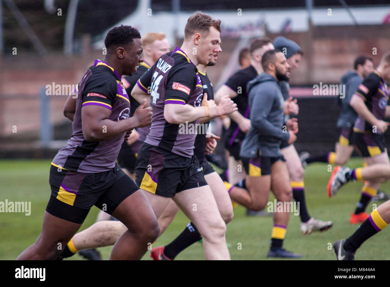 Mo Agoro (L) warms up with his Newcastle Thunder teammates after their ...