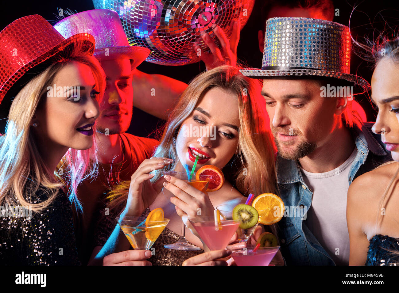 Dance party with group people dancing and disco ball Stock Photo - Alamy