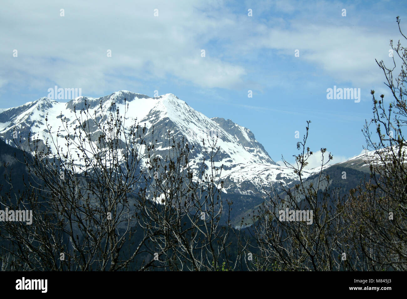 French Alps in the spring with melting snow Stock Photo - Alamy