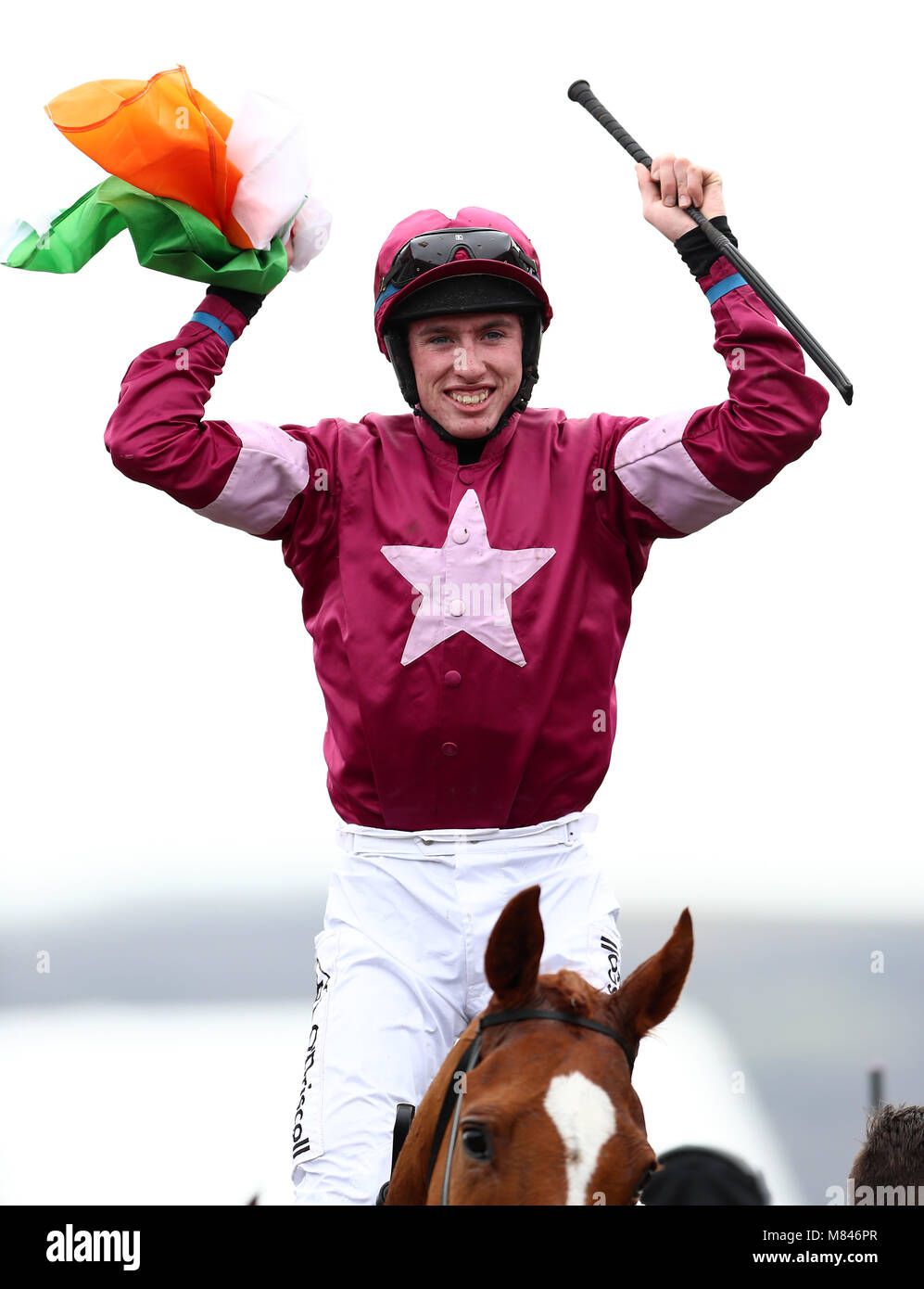 Jockey Jack Kennedy celebrates winning the Ballymore Novices' Hurdle on ...