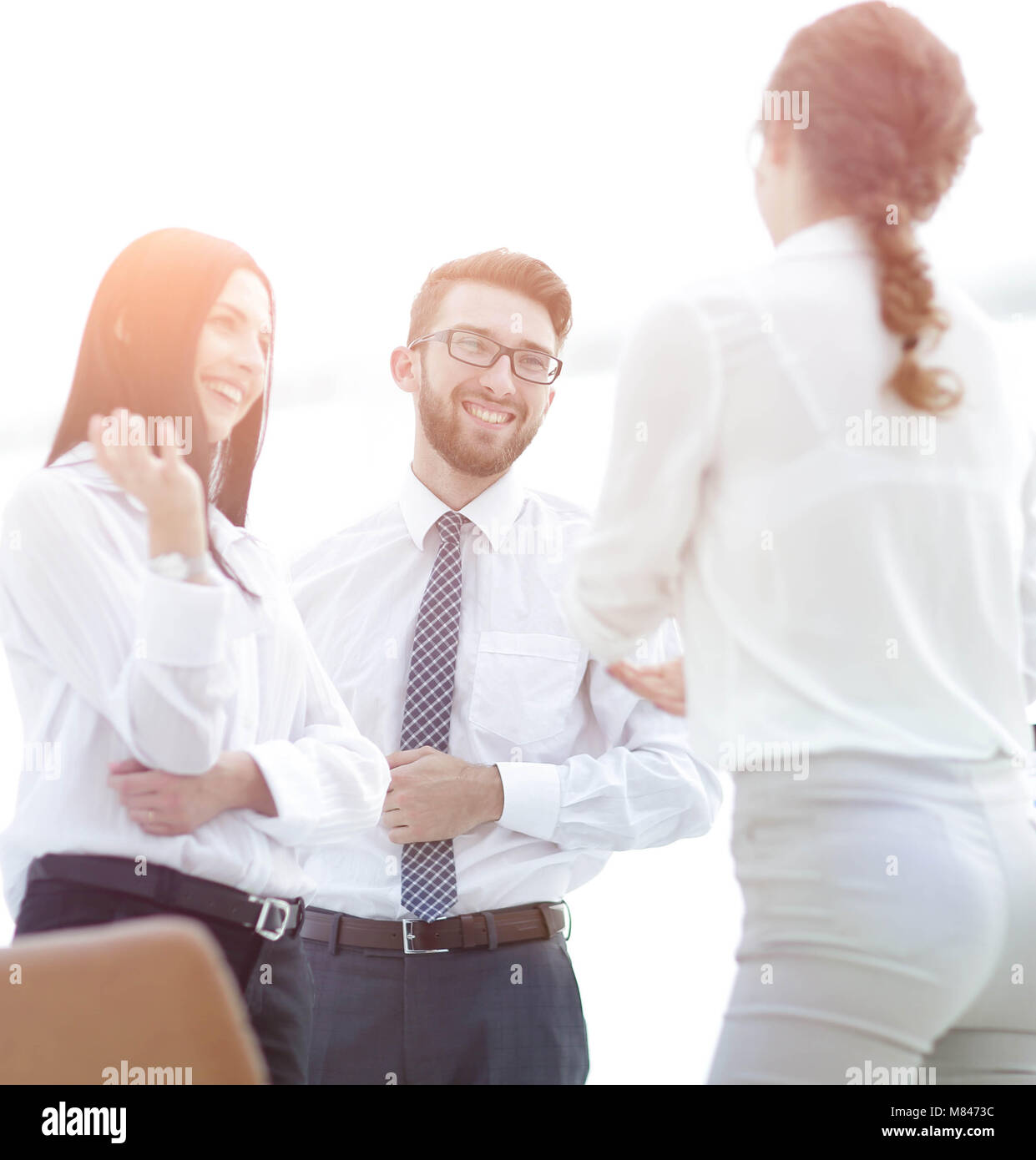 company employees are talking in the office Stock Photo - Alamy
