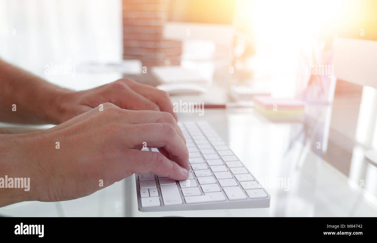 close-up of an employee typing on a personal computer keyboard Stock ...