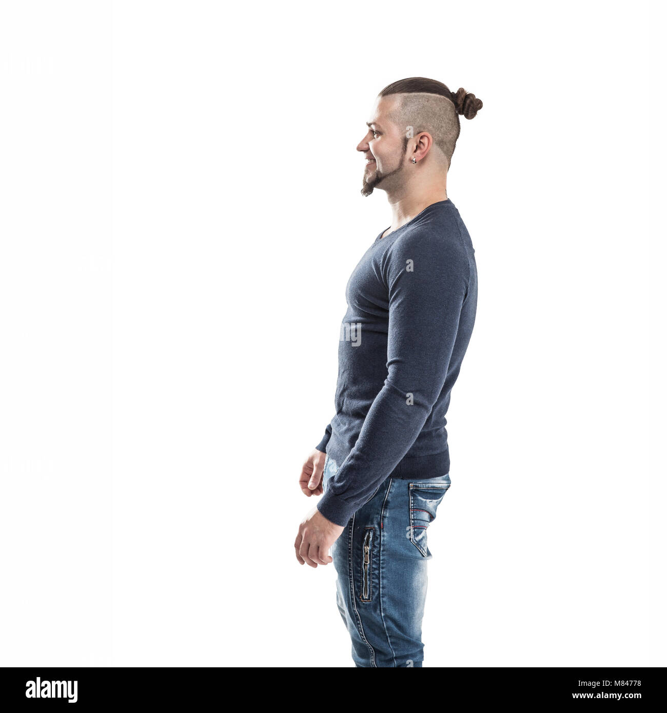 side view - the sports guy - a bodybuilder in jeans and a t-shir Stock ...