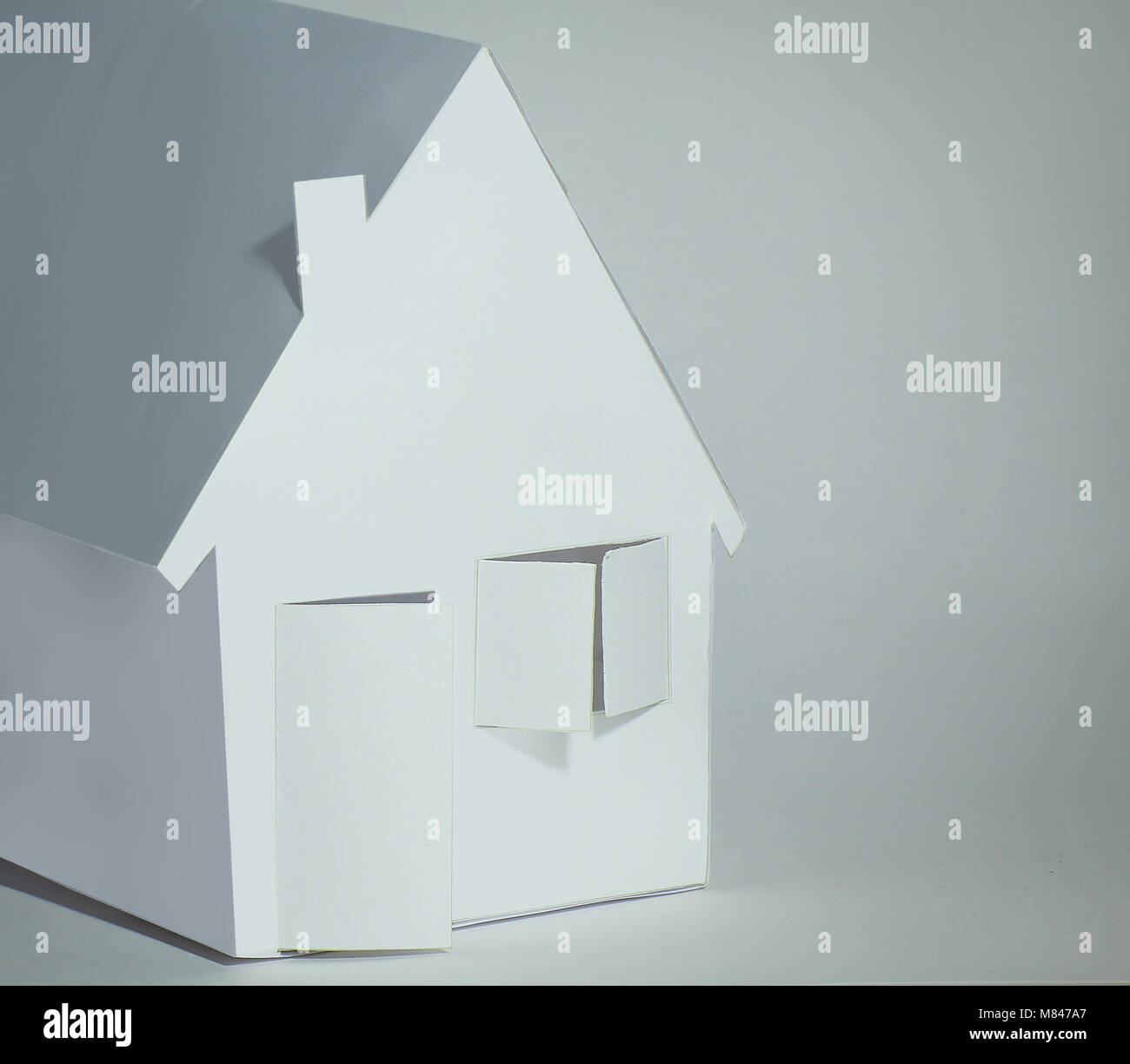 paper house paper background.the concept of a mortgage Stock Photo - Alamy