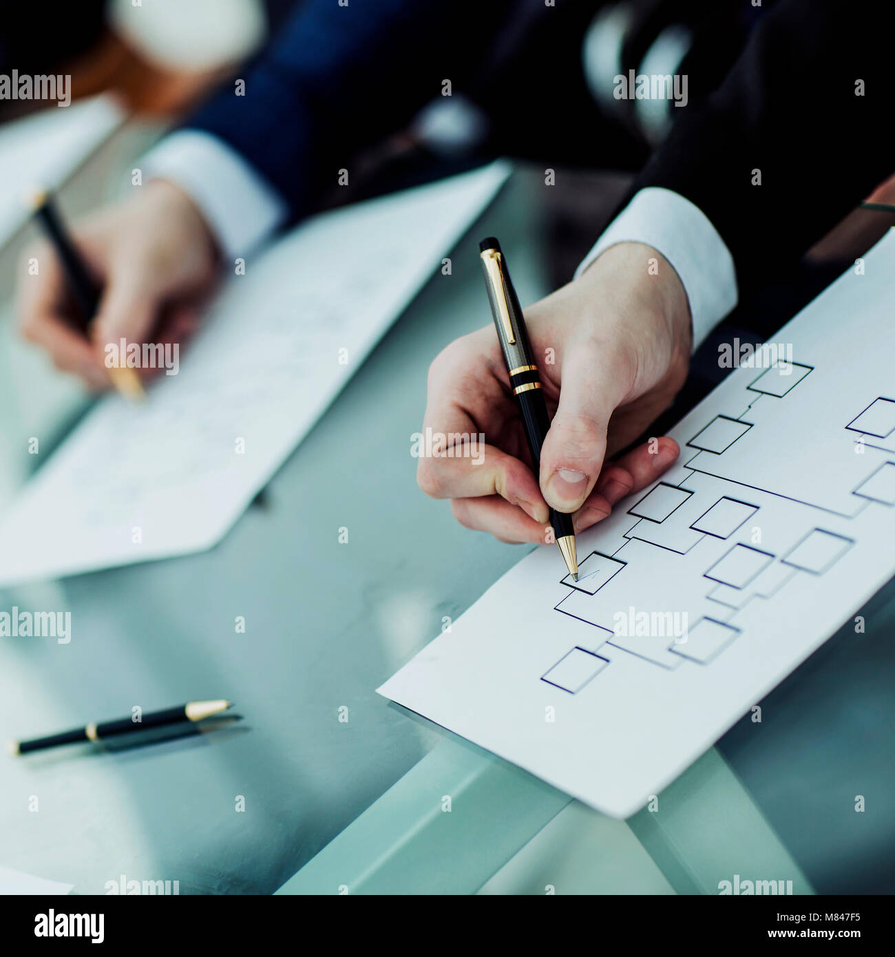 hands business team that works with financial schemes Stock Photo - Alamy