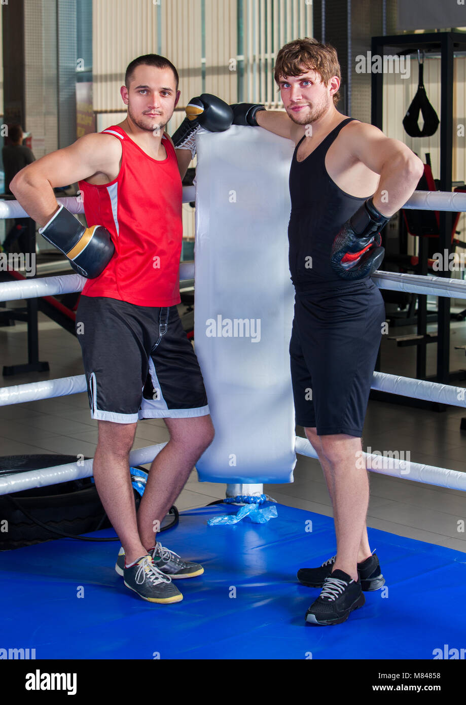 Boxing ring with two men boxer. Man engage martial arts Stock Photo - Alamy