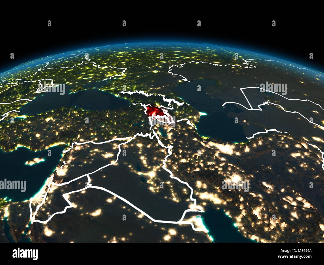 Space orbit view of Armenia highlighted in red on planet Earth at night with visible country ...