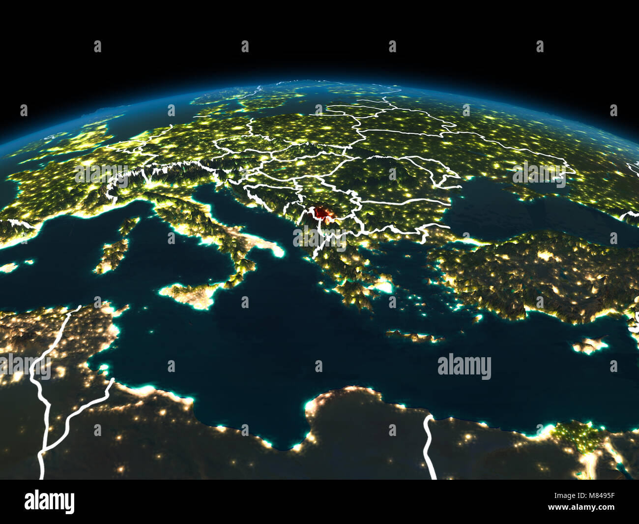 Space orbit view of Kosovo highlighted in red on planet Earth at night with visible country ...