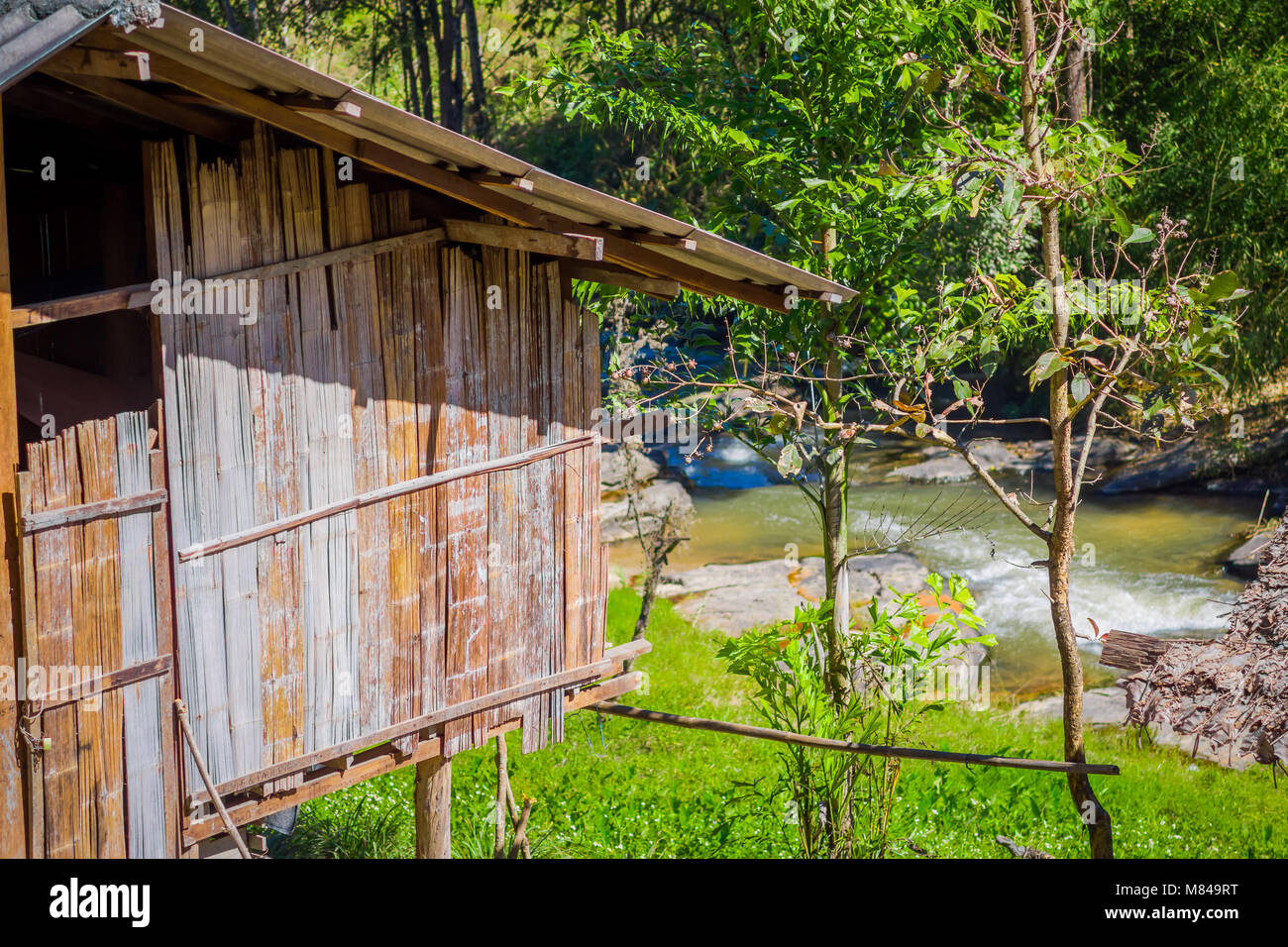Outdoor view of a gorgeous house building with bamboo cane in tropical ...