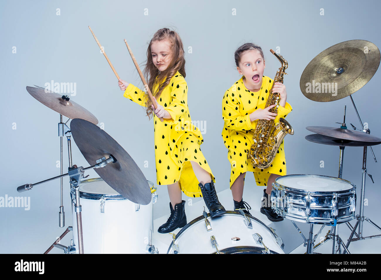 The teen music band performing in a recording studio Stock Photo - Alamy