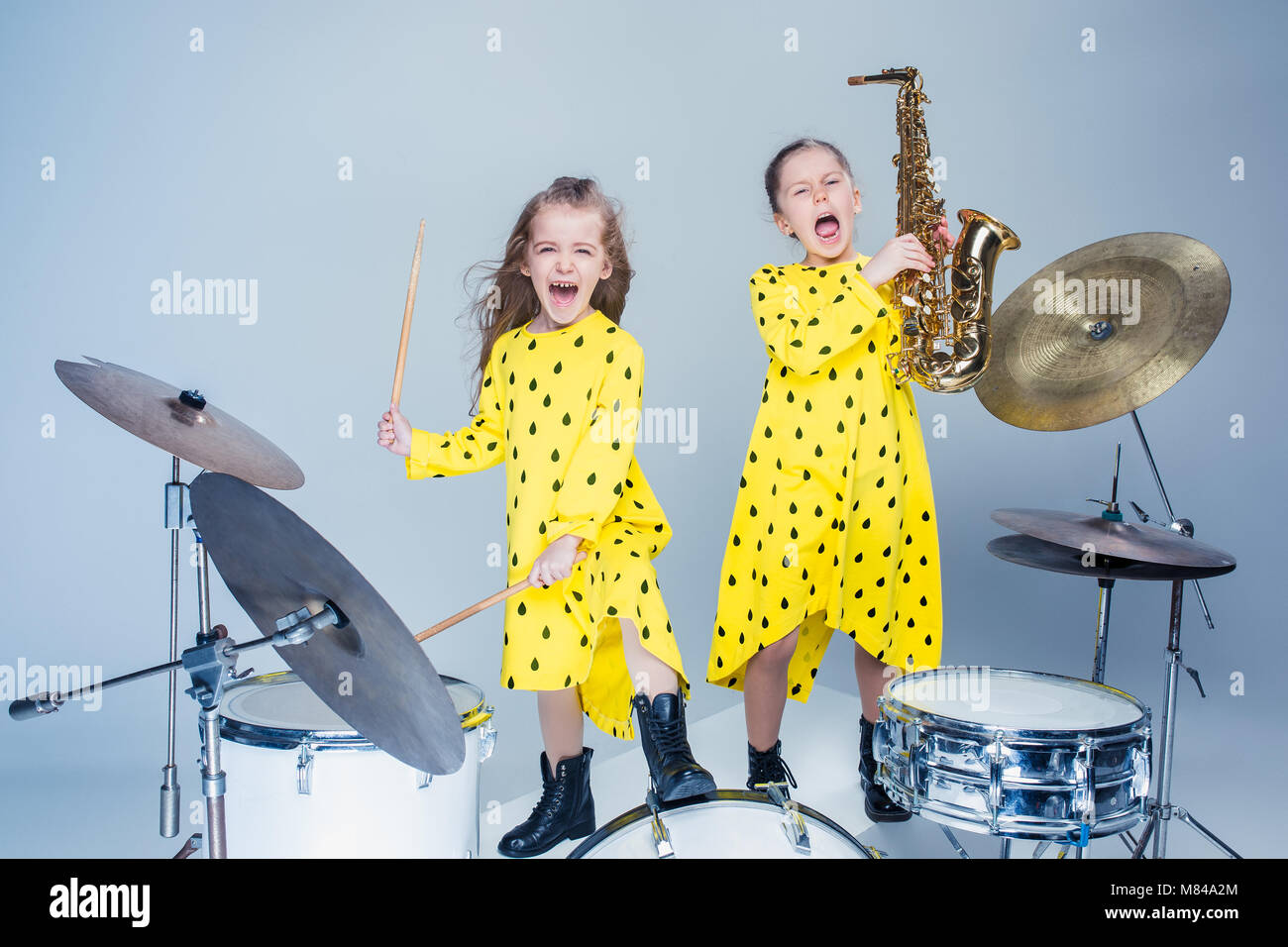 The teen music band performing in a recording studio Stock Photo - Alamy