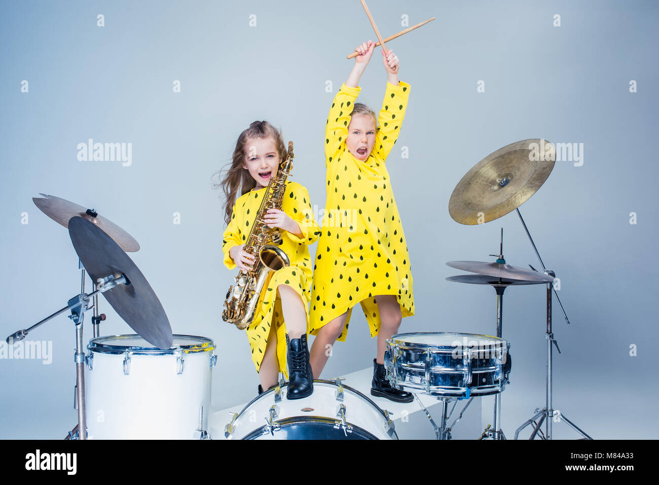The teen music band performing in a recording studio Stock Photo - Alamy